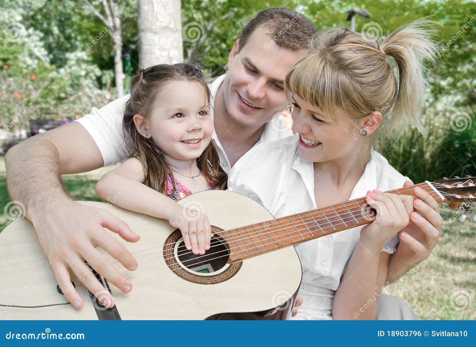 Family plaing guitar stock photo. Image of boyfriend - 18903796