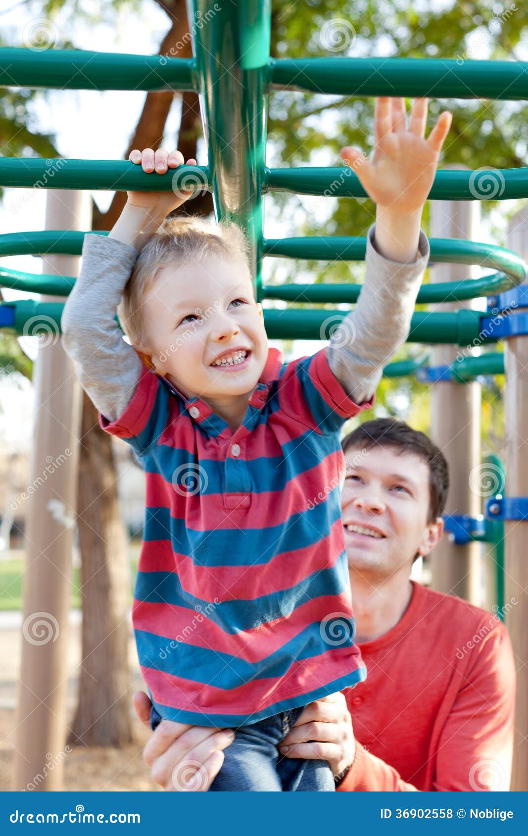 Family at the playground stock photo. Image of climbing - 36902558
