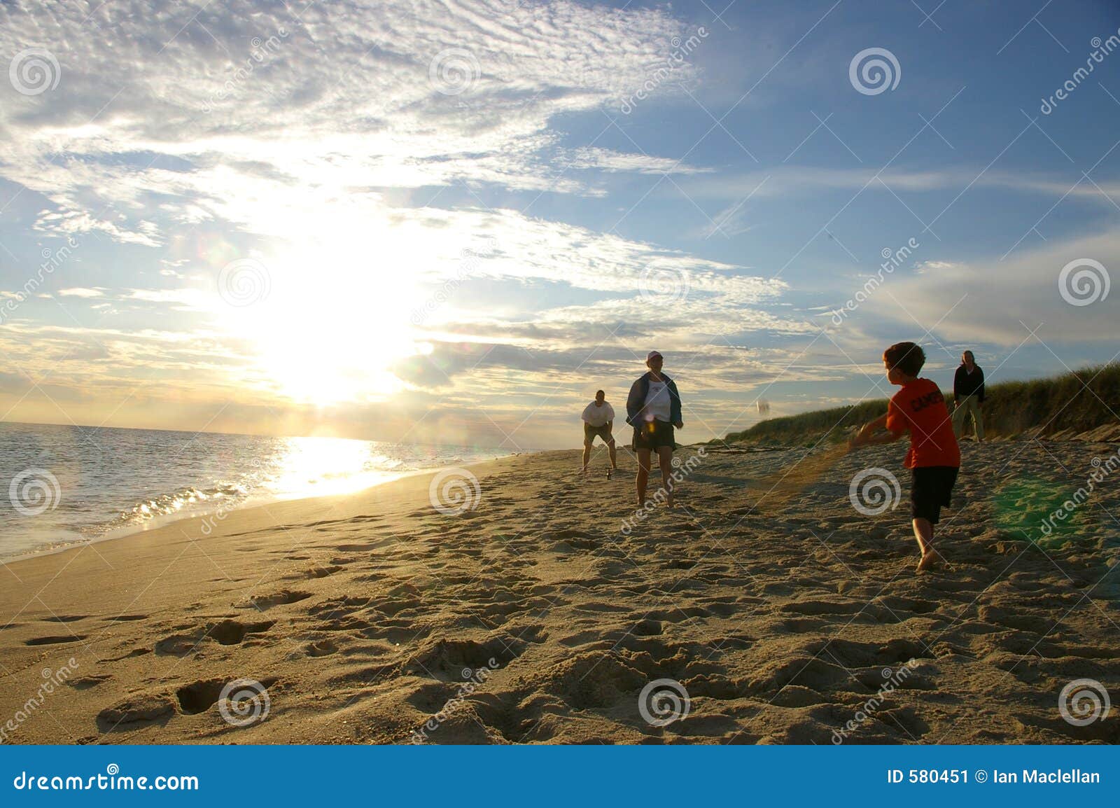 Family playing baseball stock image. Image of sand, beach - 580451