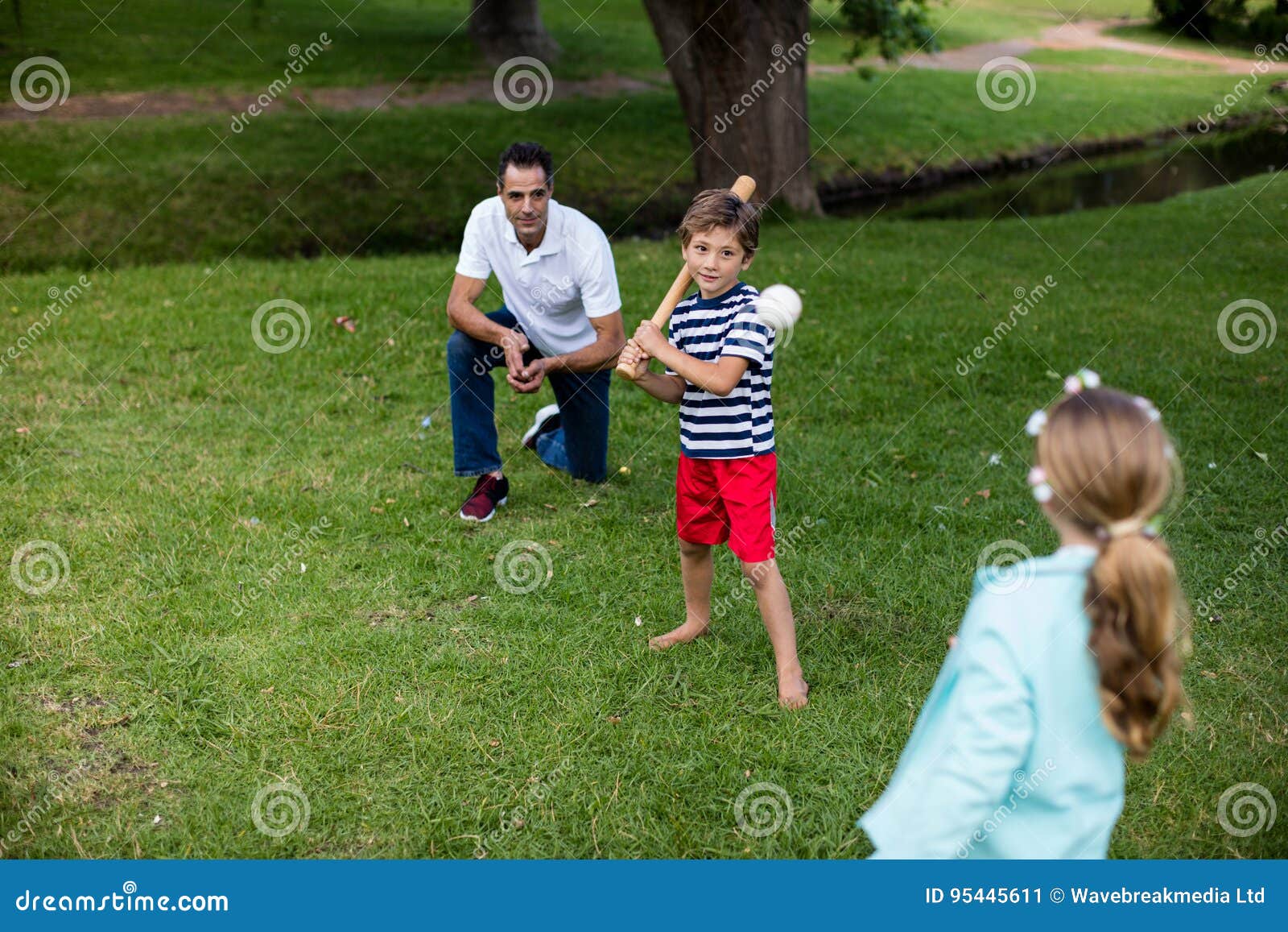 Family Playing Baseball in the Park Stock Image - Image of life ...