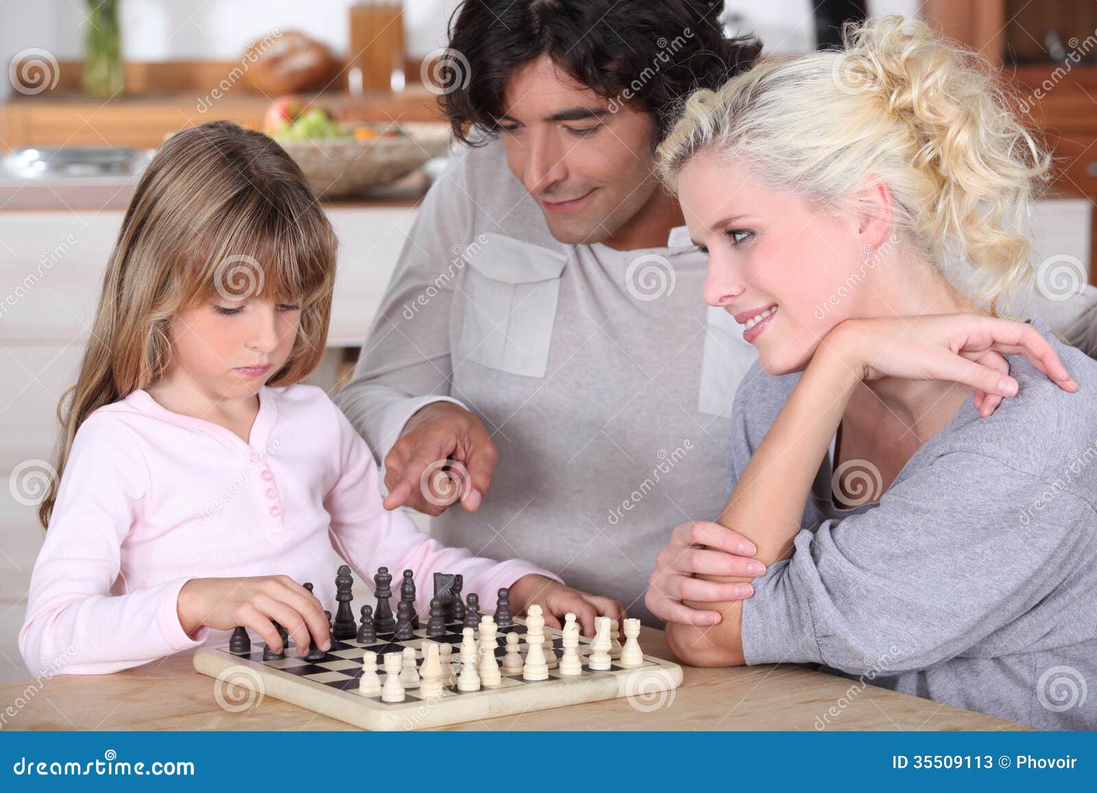 Family playing chess stock image. Image of life, family - 35509113