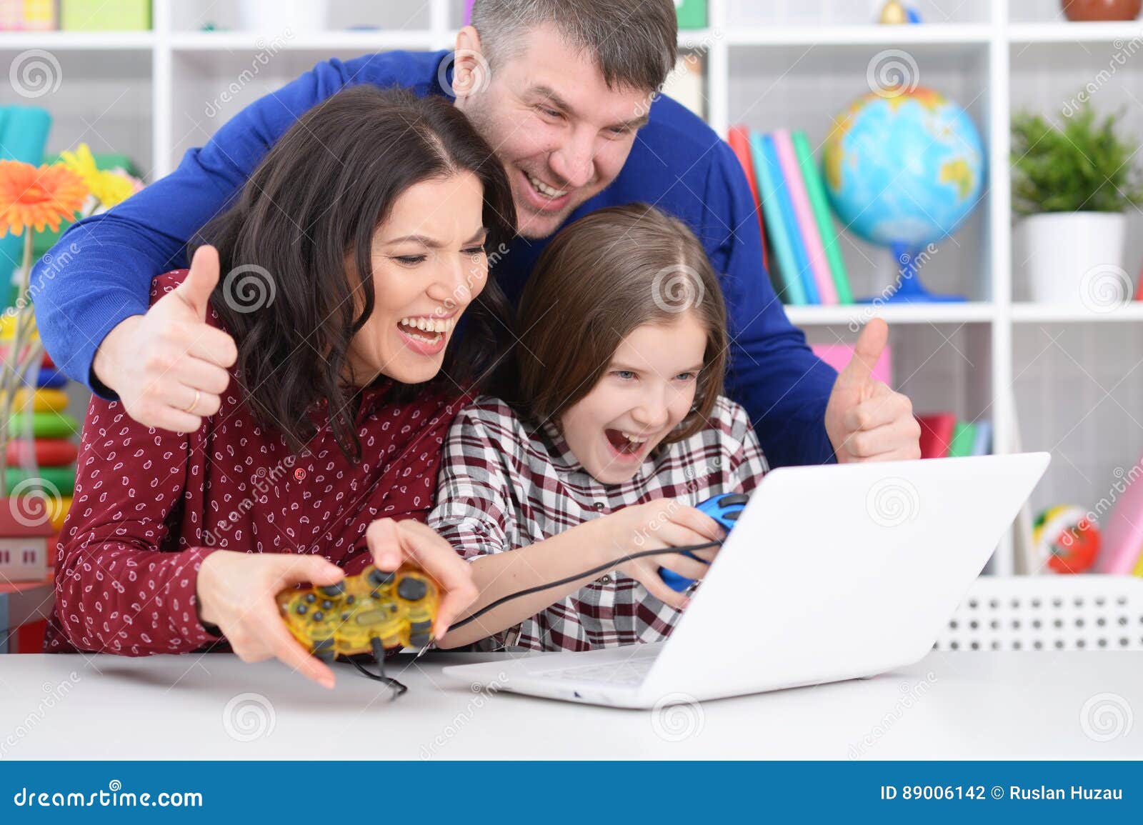 Family Playing a Computer Game Stock Photo - Image of mother, young ...