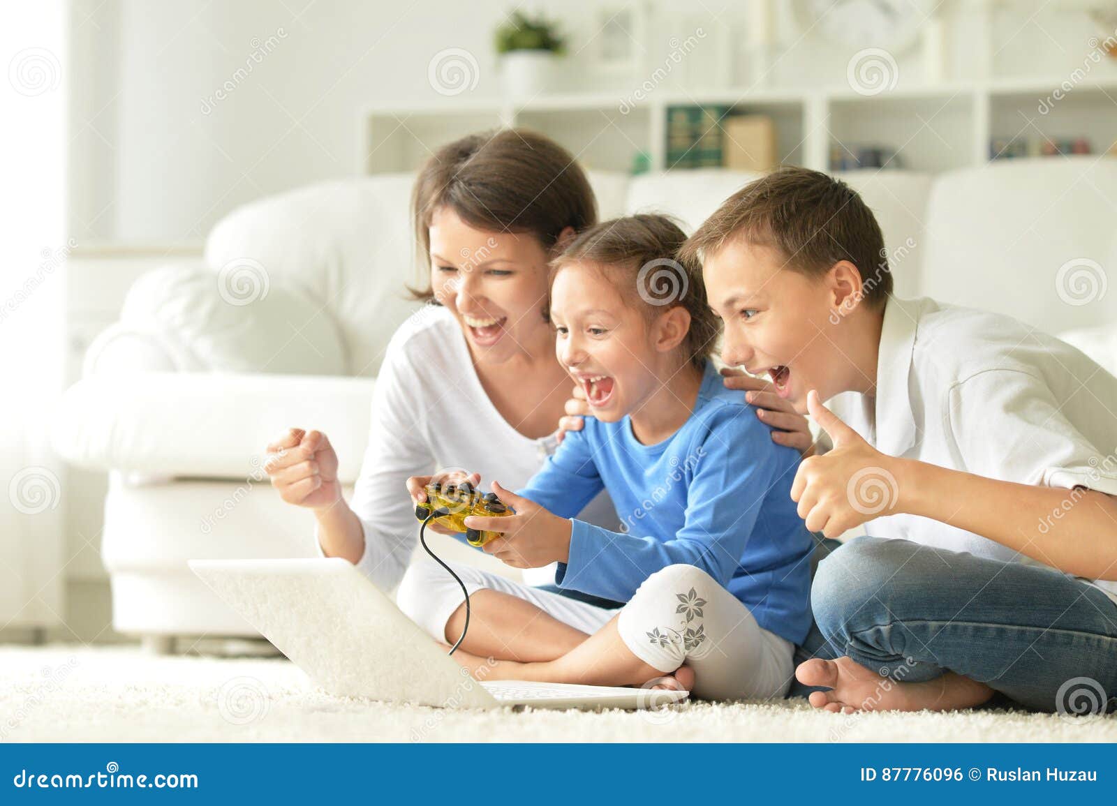 Family Playing Computer Games Stock Photo - Image of daughter, games ...