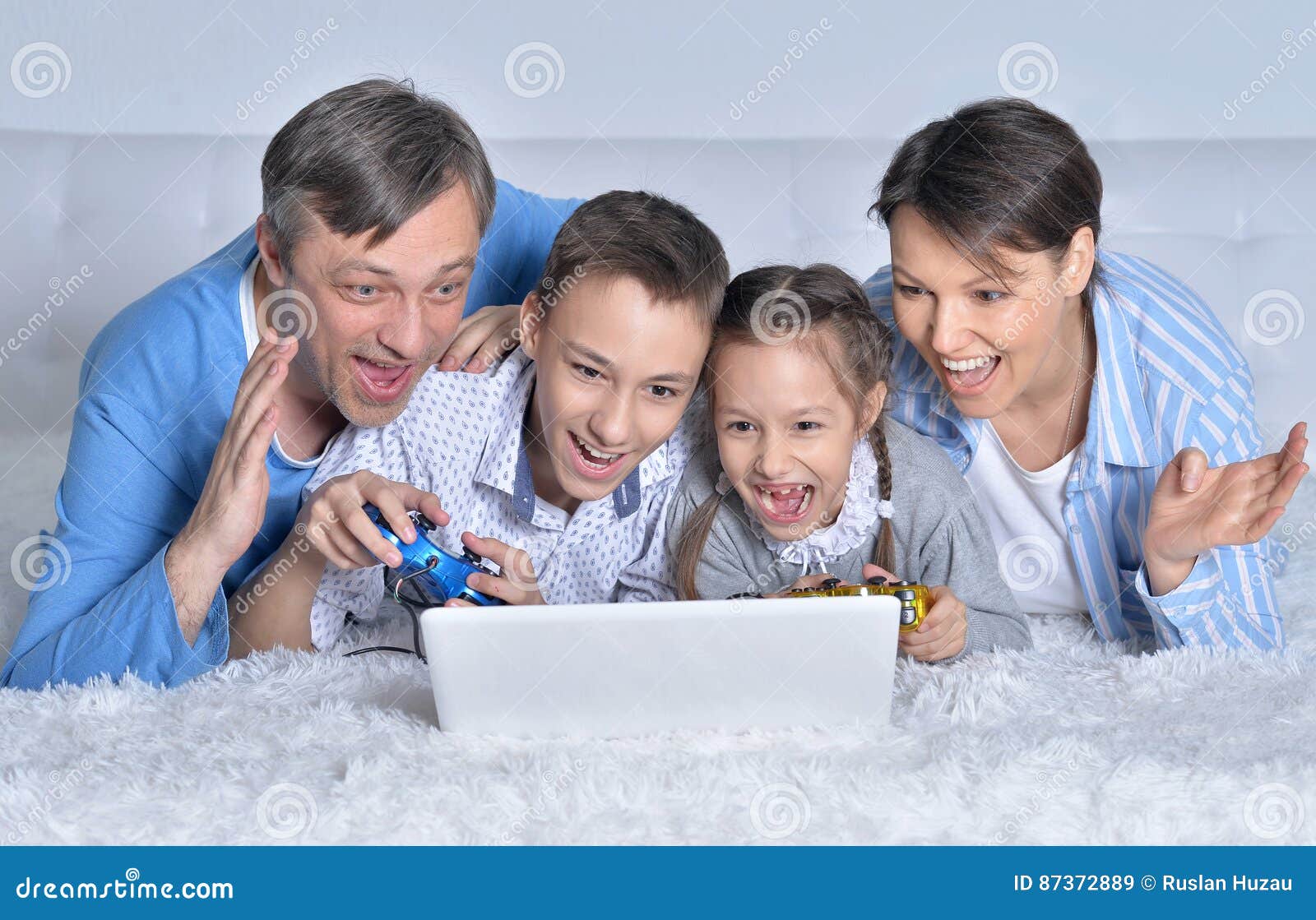 Family Playing Computer Games Stock Image - Image of parents, cute ...