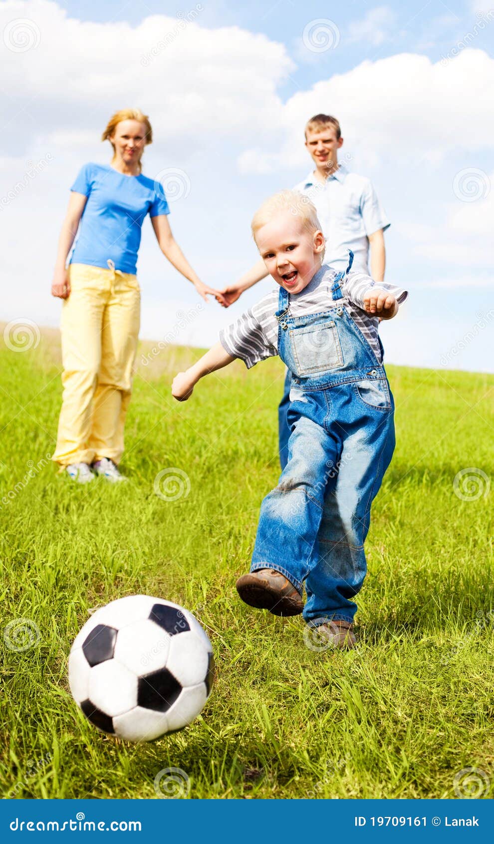 Family playing football stock image. Image of affectionate - 19709161