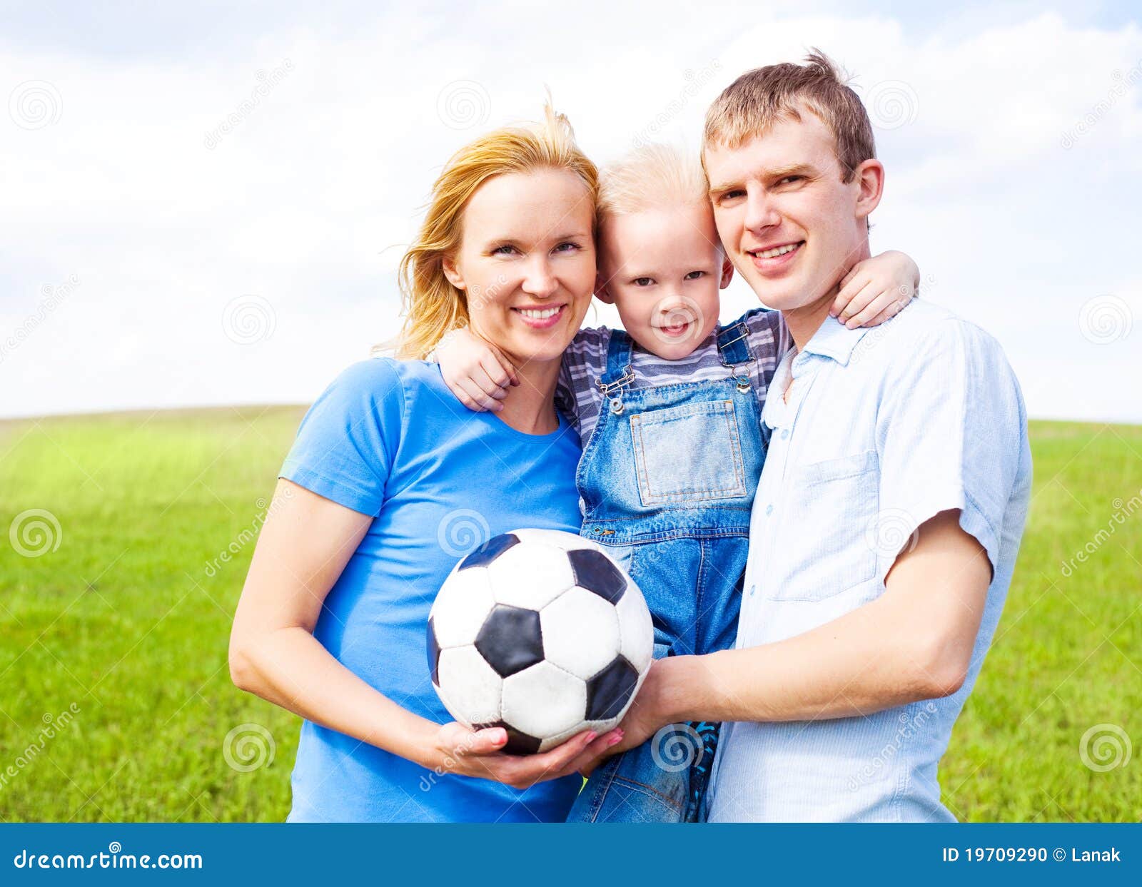 Family playing football stock photo. Image of happy, field - 19709290