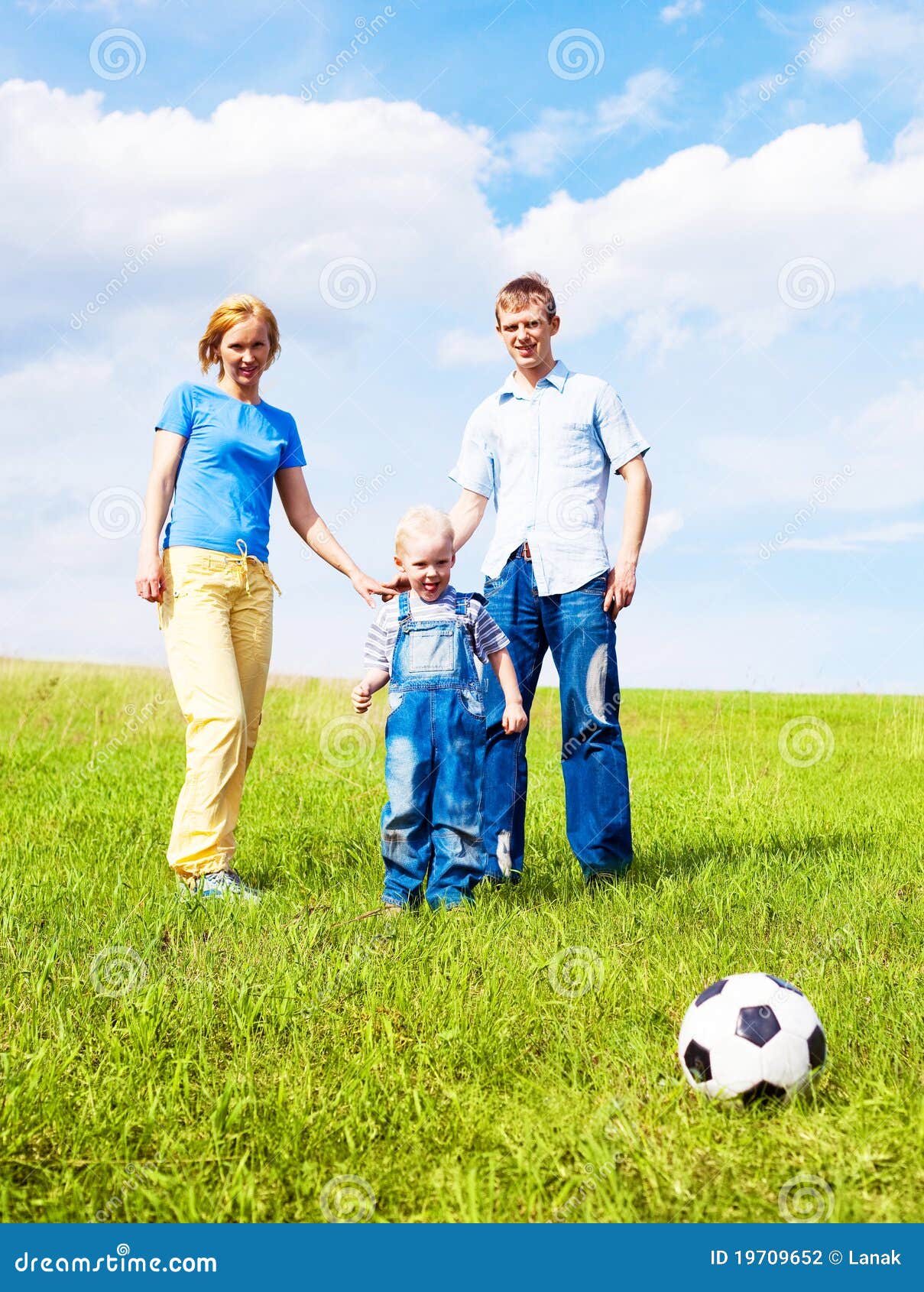 Family playing football stock photo. Image of affection - 19709652