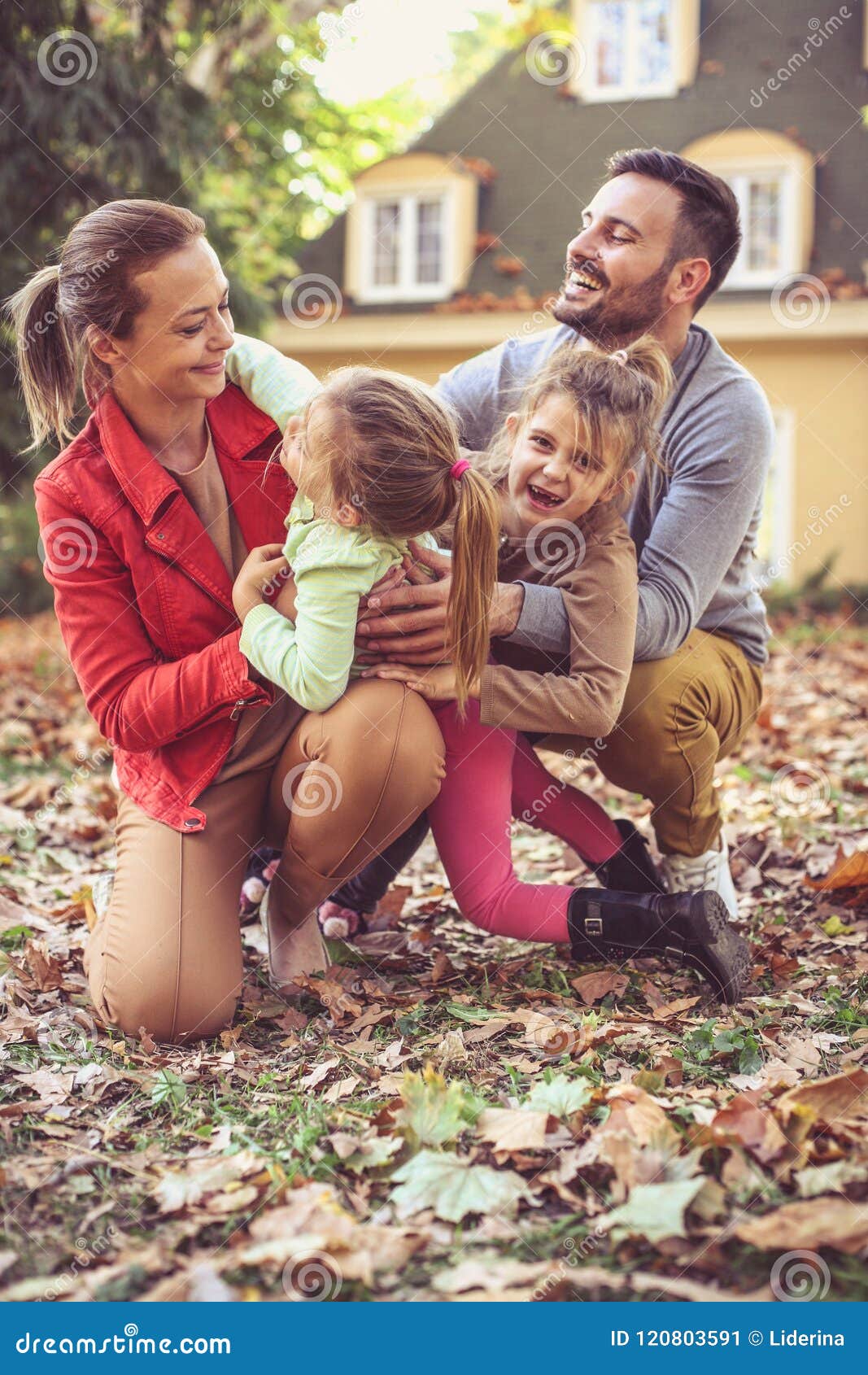 Family Playing at Front of the Backyard. on the Move Stock Image ...
