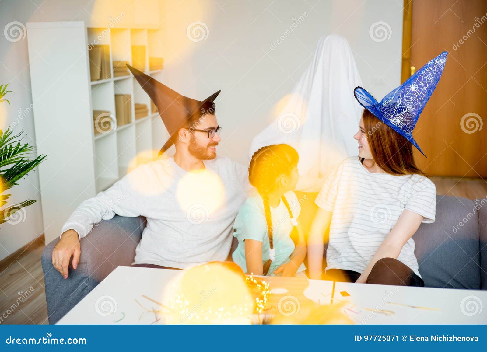 Family Of Witches And Wizards Walking In The Autumn Forest Holding ...
