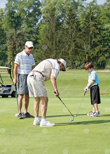 Family Playing Golf stock photo. Image of male, children - 7793102