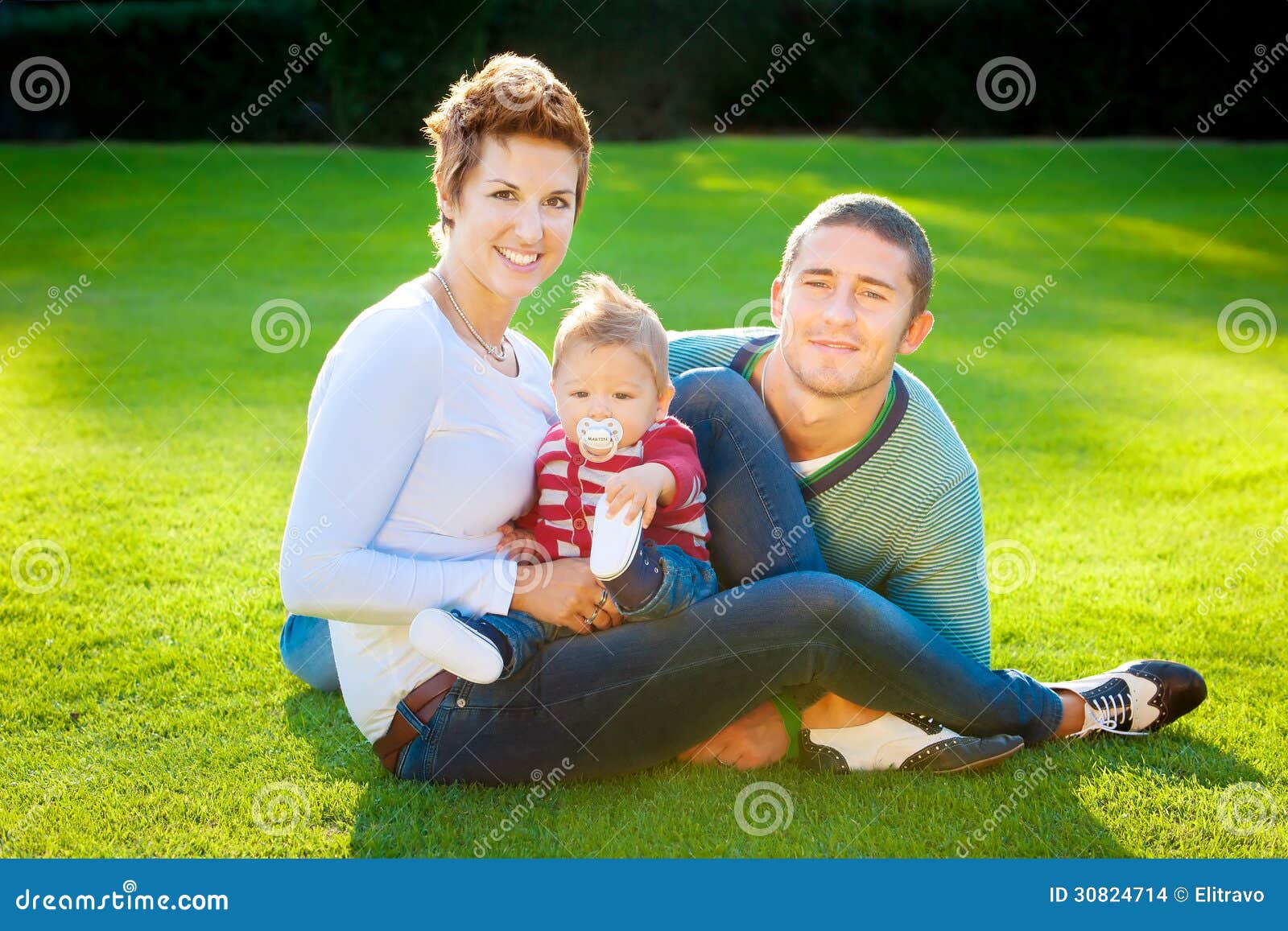 Family playing on grass stock photo. Image of infant - 30824714