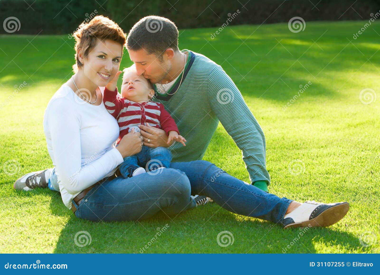 Family playing on grass stock image. Image of cheerful - 31107255