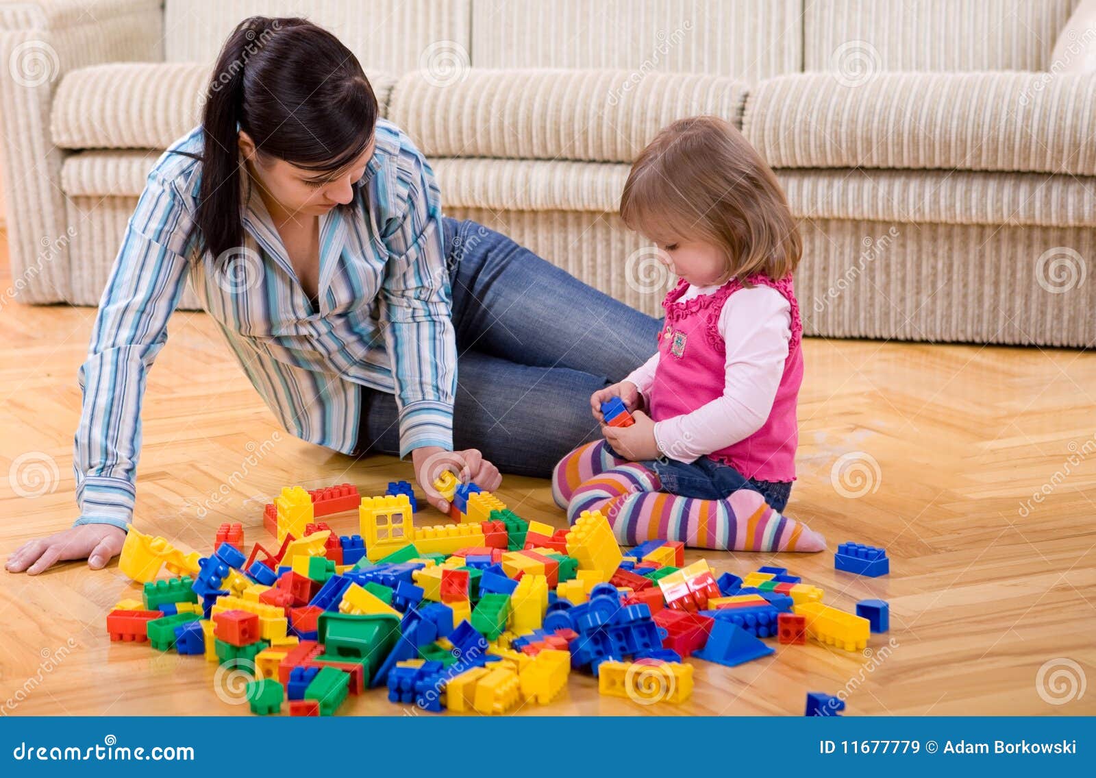 Family playing at home stock image. Image of colorful - 11677779
