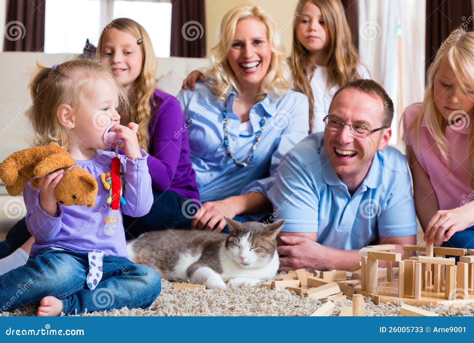 Family playing at home stock image. Image of sisters - 26005733