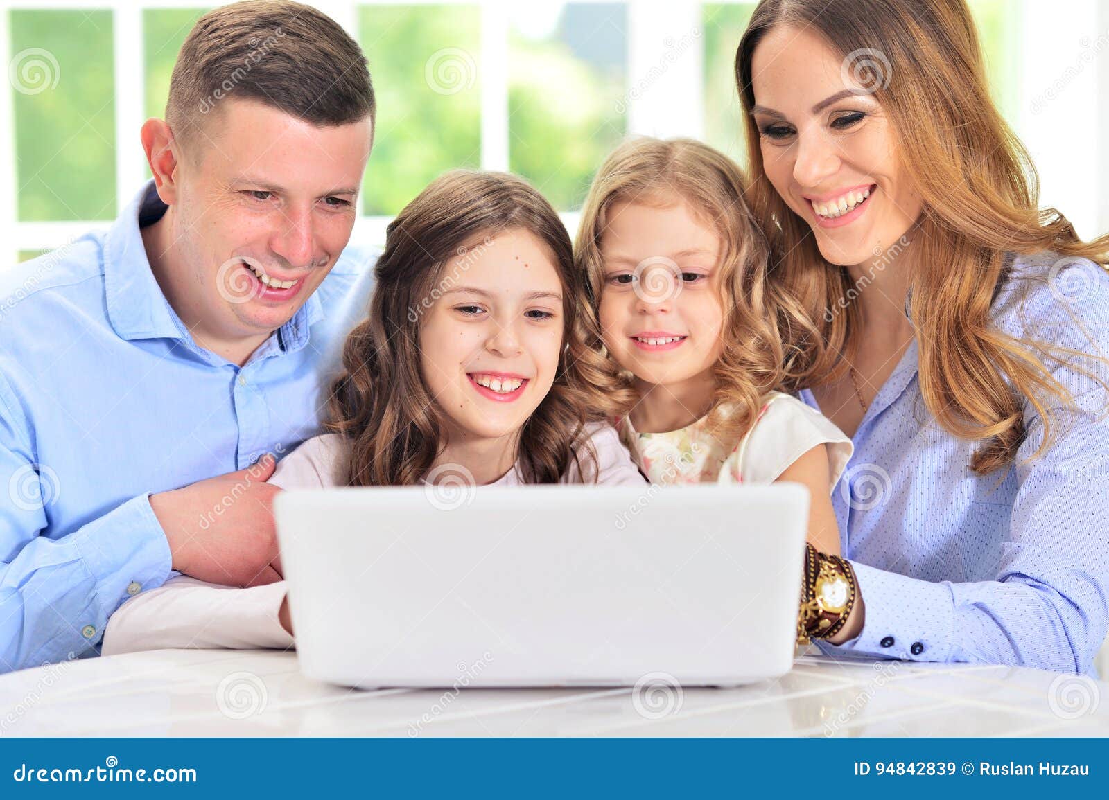 Family Playing on Laptop at Table Stock Image - Image of kids, health ...