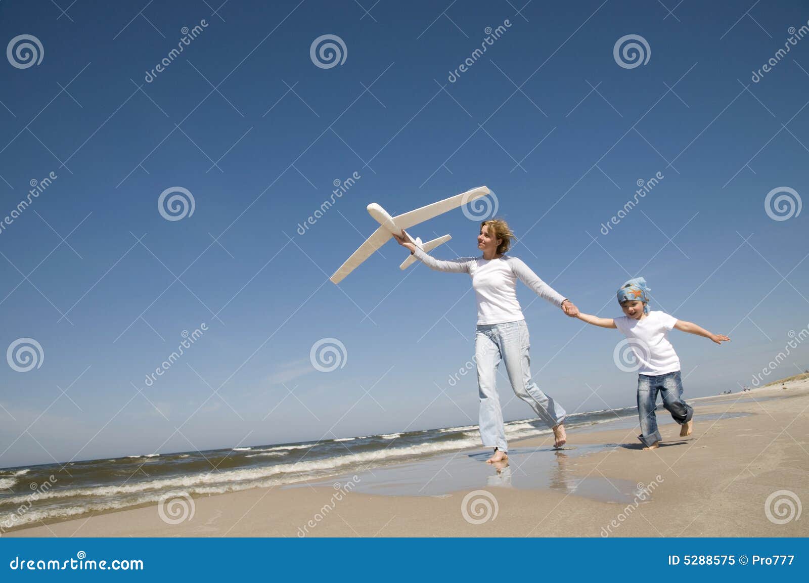 Family Playing with Plane Model Stock Image - Image of effort, discover ...
