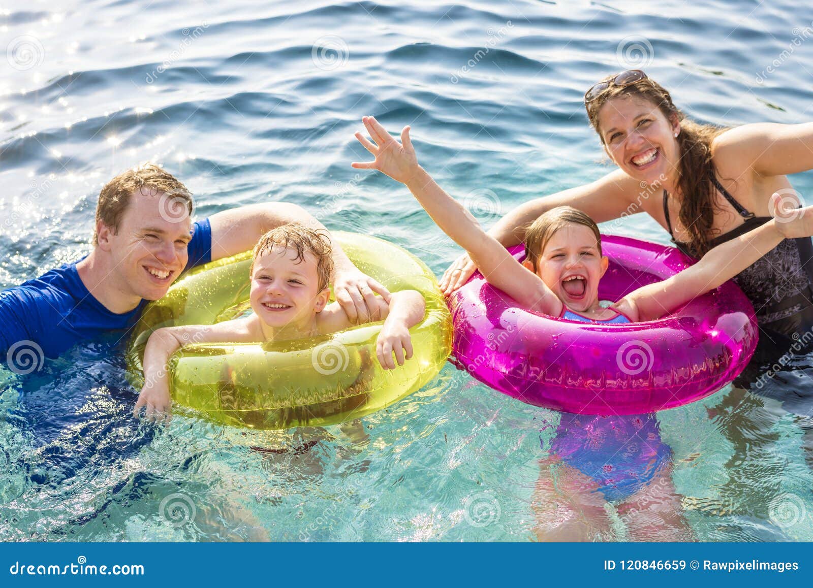 Family playing in a pool stock image. Image of brother - 120846659