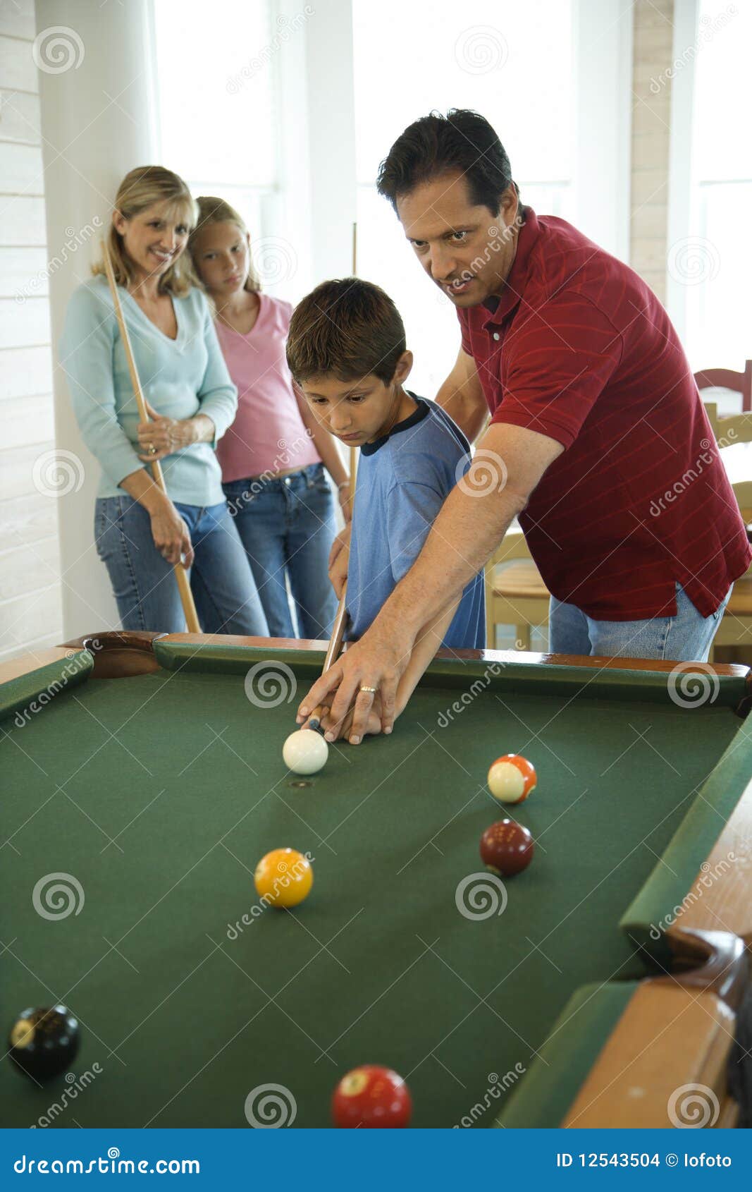 Family Playing Pool stock photo. Image of leisure, person - 12543504