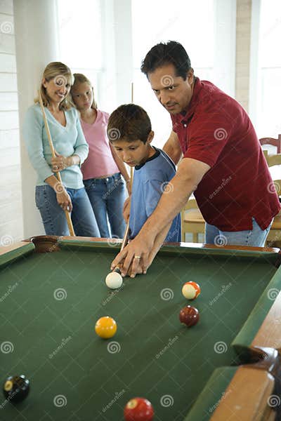 Family Playing Pool stock photo. Image of leisure, person - 12543504