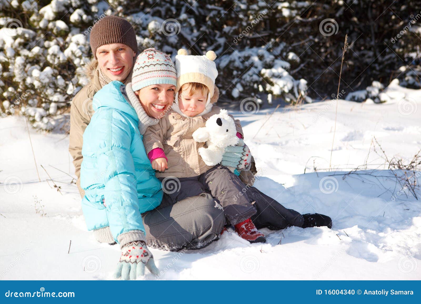 Family playing on snow stock photo. Image of girl, bear - 16004340