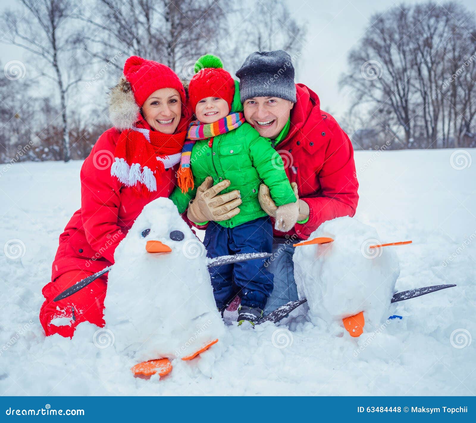 Family playing snow stock photo. Image of casual, christmas - 63484448