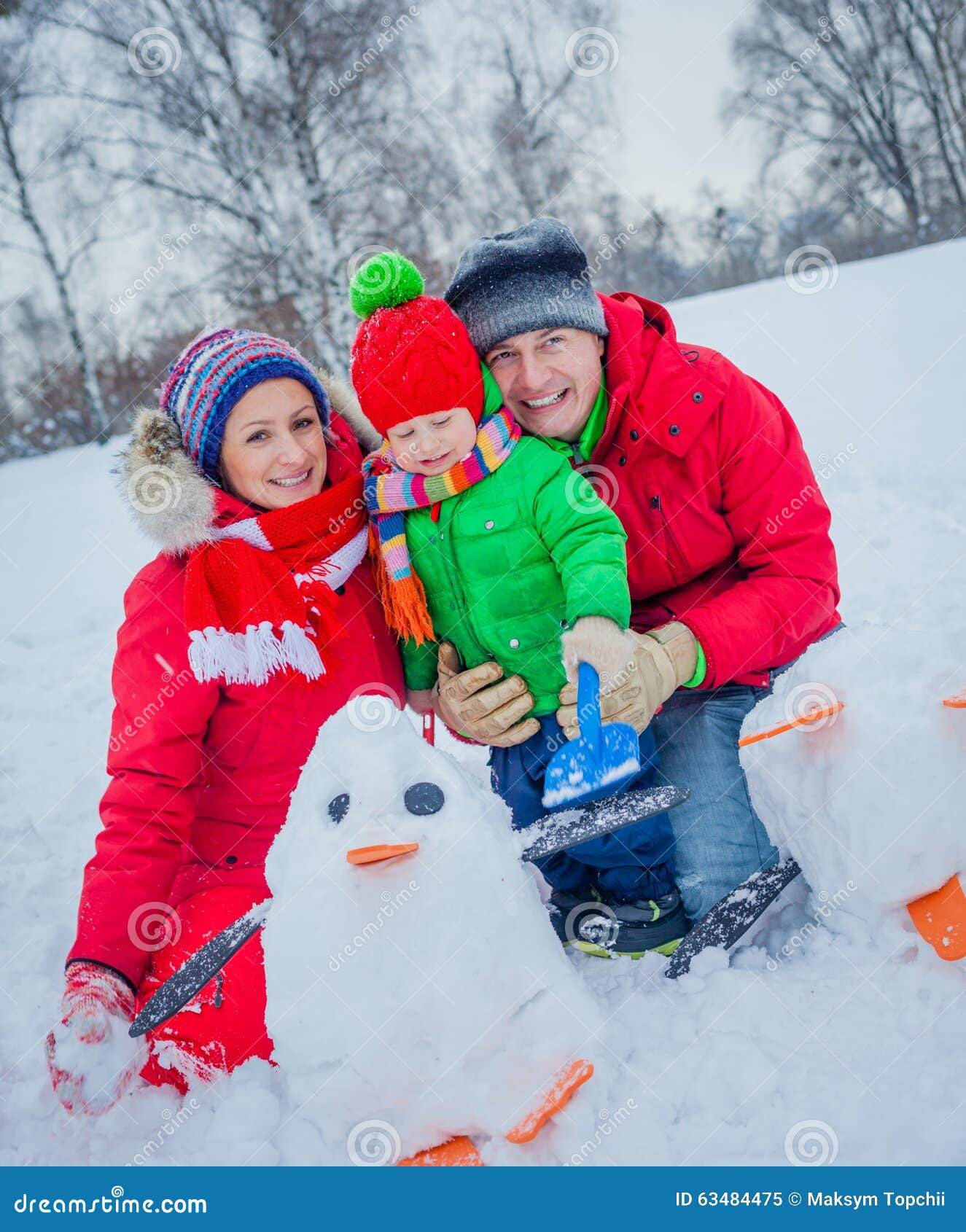 Family playing snow stock image. Image of cold, beautiful - 63484475