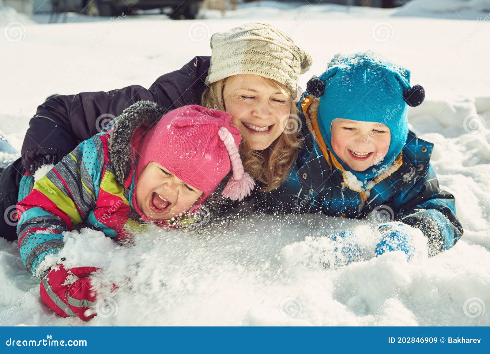 Family Playing with Snow in the Winter Outdoors Stock Image - Image of ...