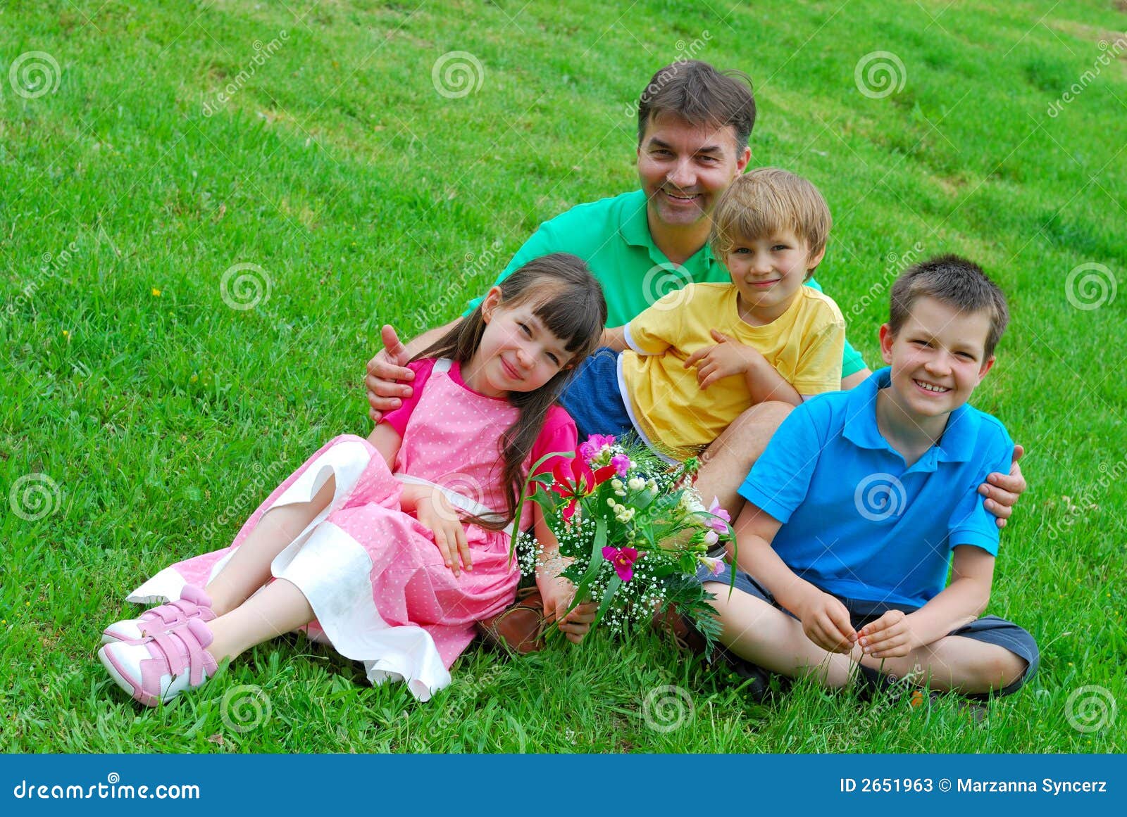 Family posing on lawn stock image. Image of grass, meadow - 2651963