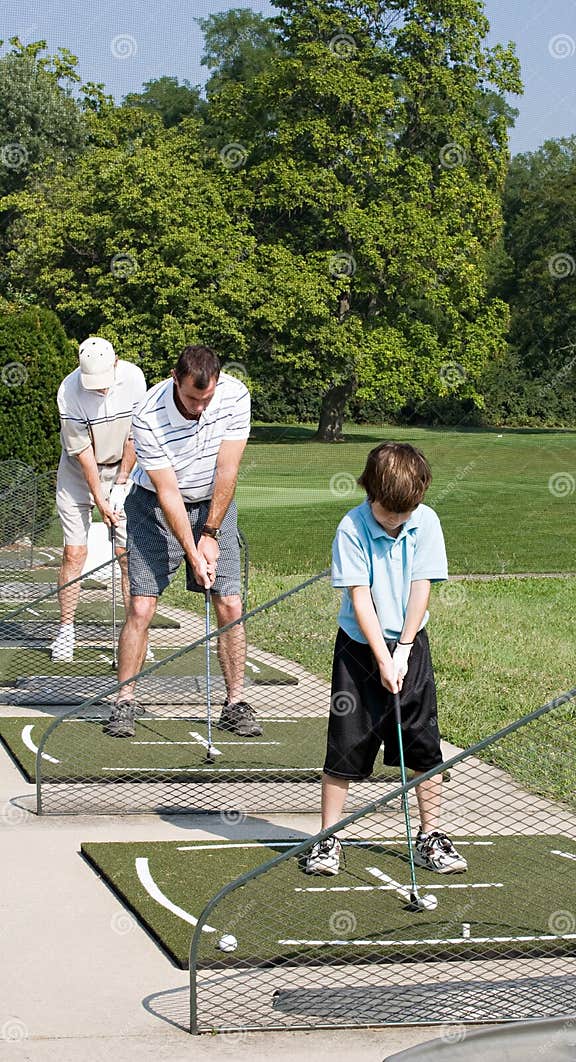 Family Practicing Golf stock image. Image of group, grandfather - 8074591