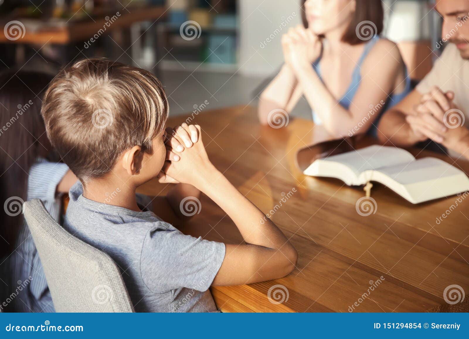 Family praying at home stock photo. Image of girl, peace - 151294854