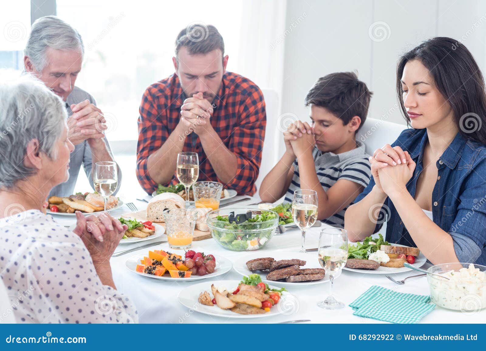Family Praying Together before Meal Stock Photo - Image of abode ...