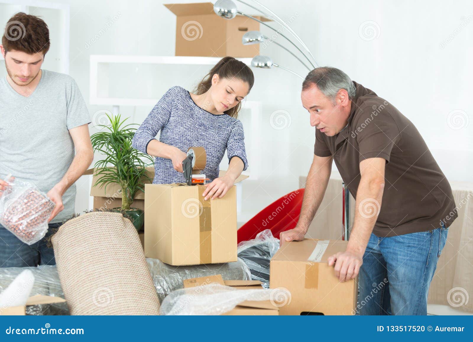 Family Preparing To Relocate Stock Photo - Image of relocation ...