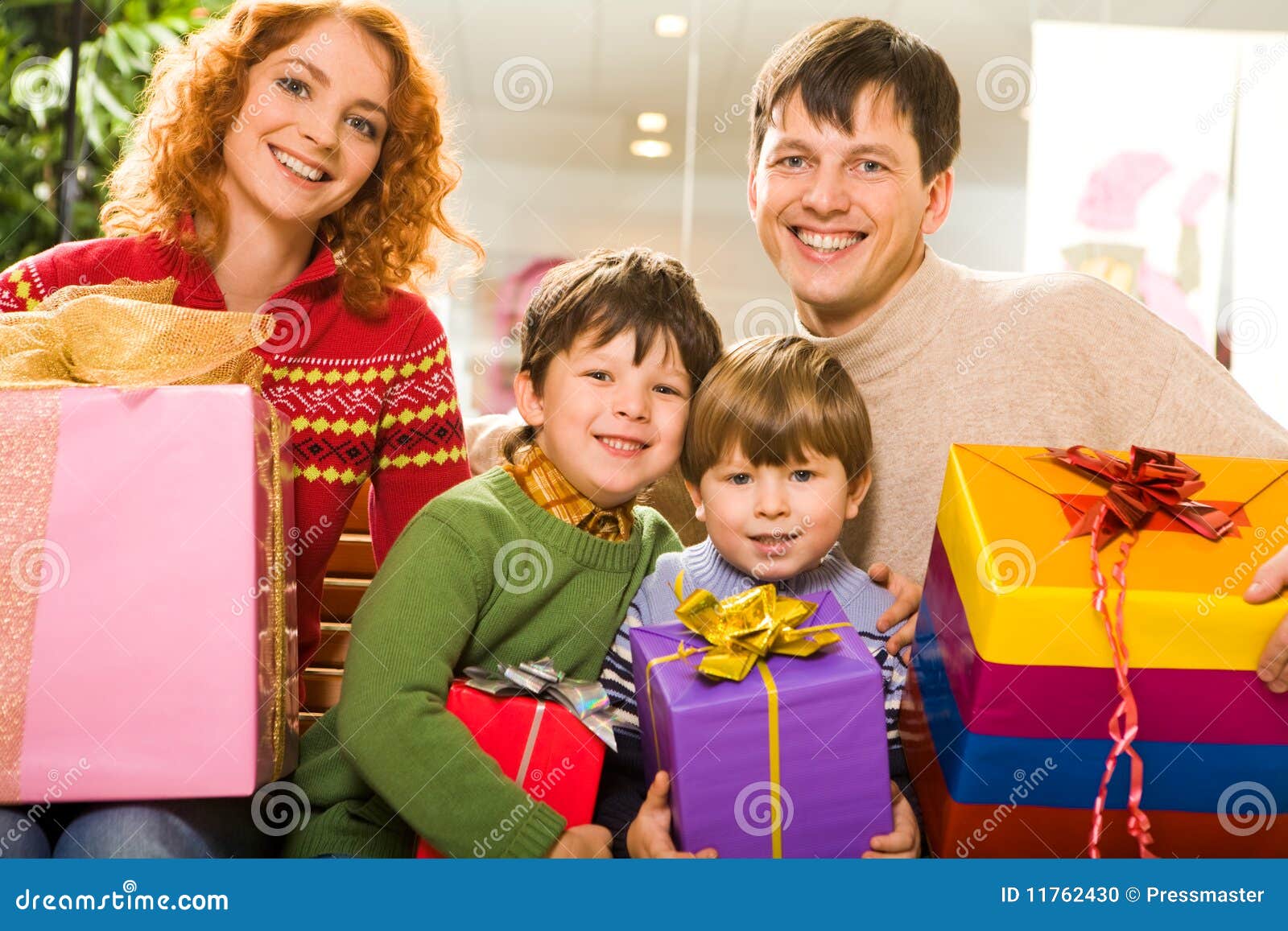 Family with presents stock photo. Image of hand, celebration - 11762430