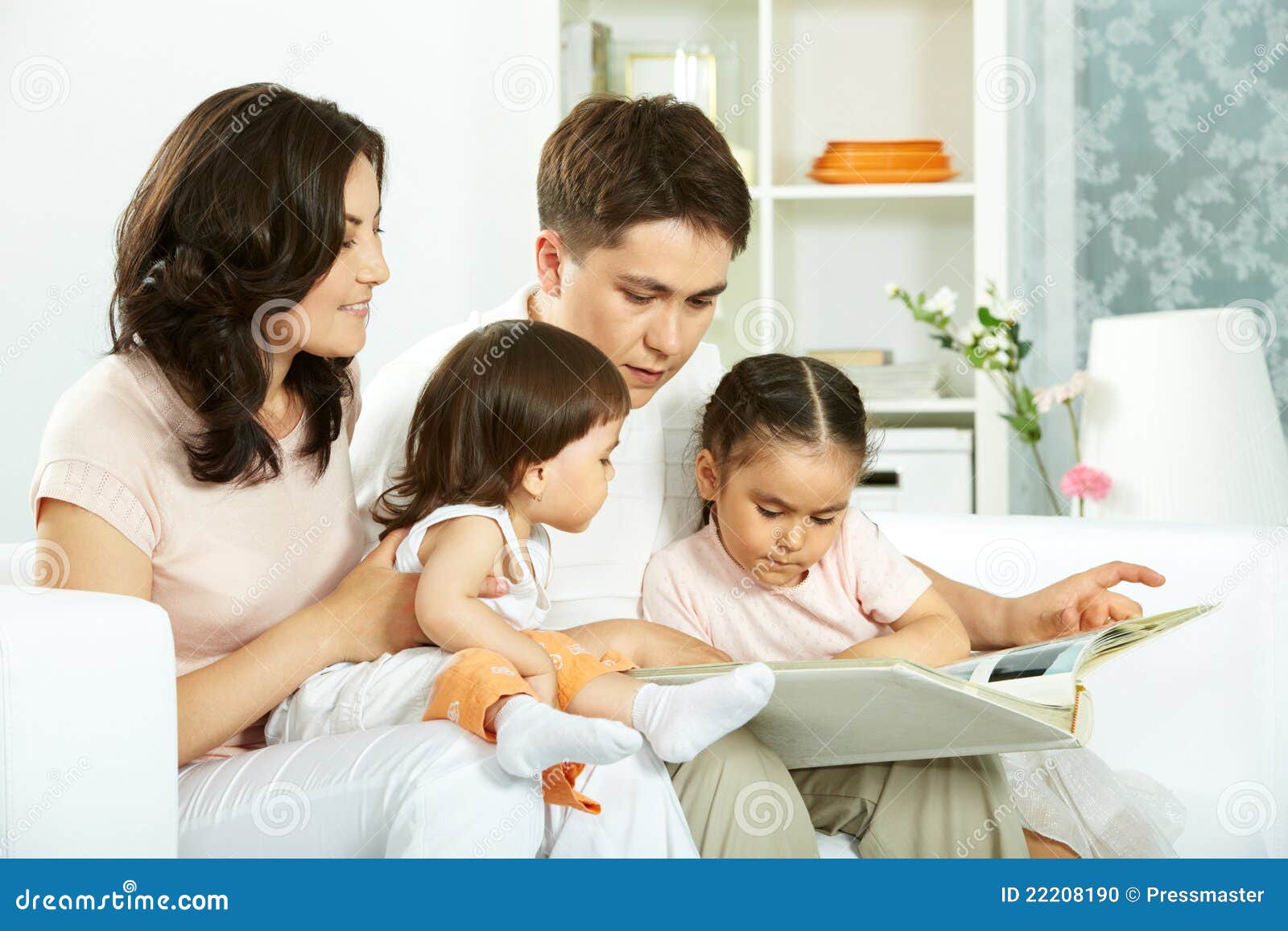 Family reading stock photo. Image of parents, casual - 22208190