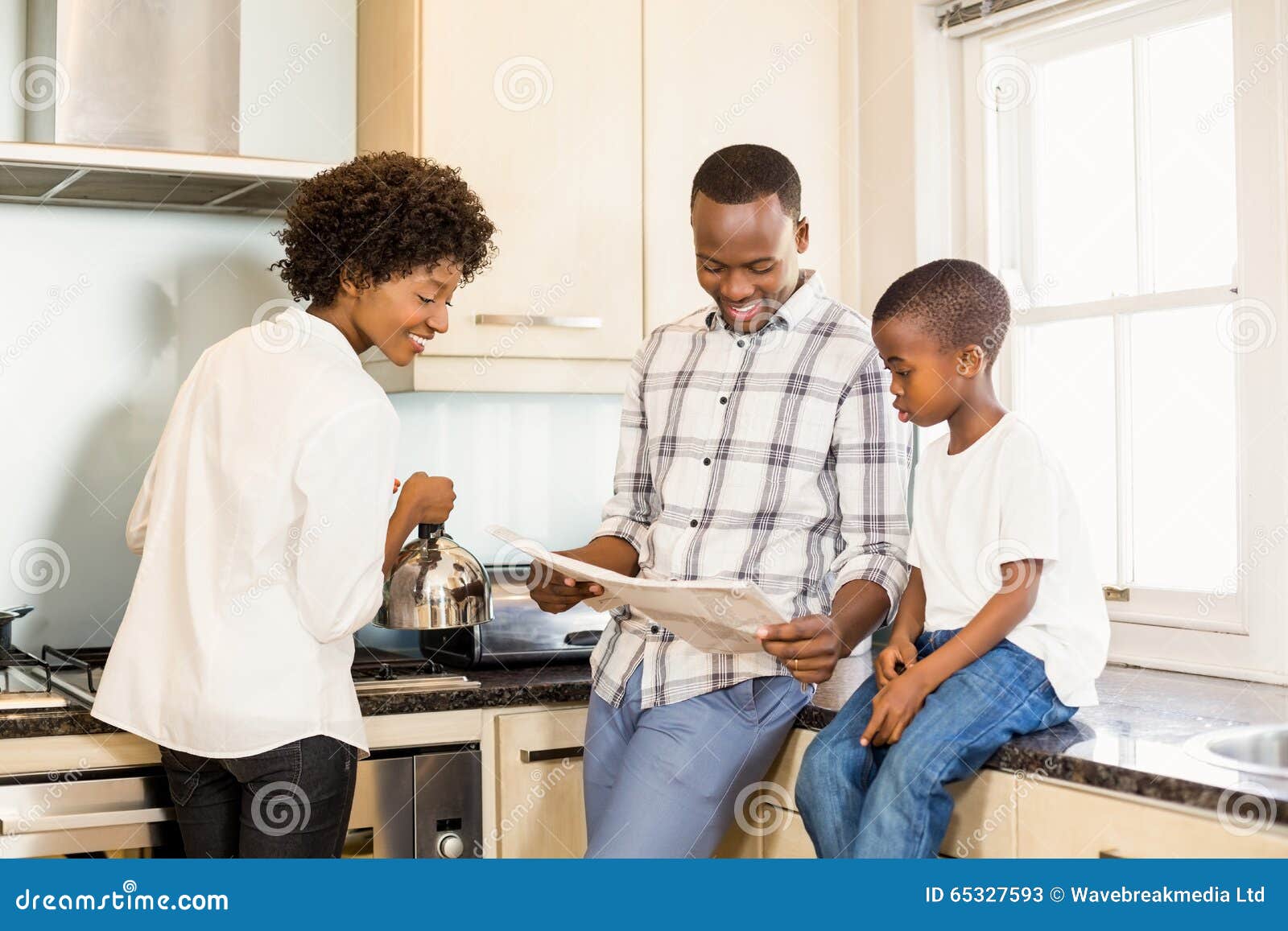 Family Reading in the Kitchen Stock Image - Image of counter, family ...