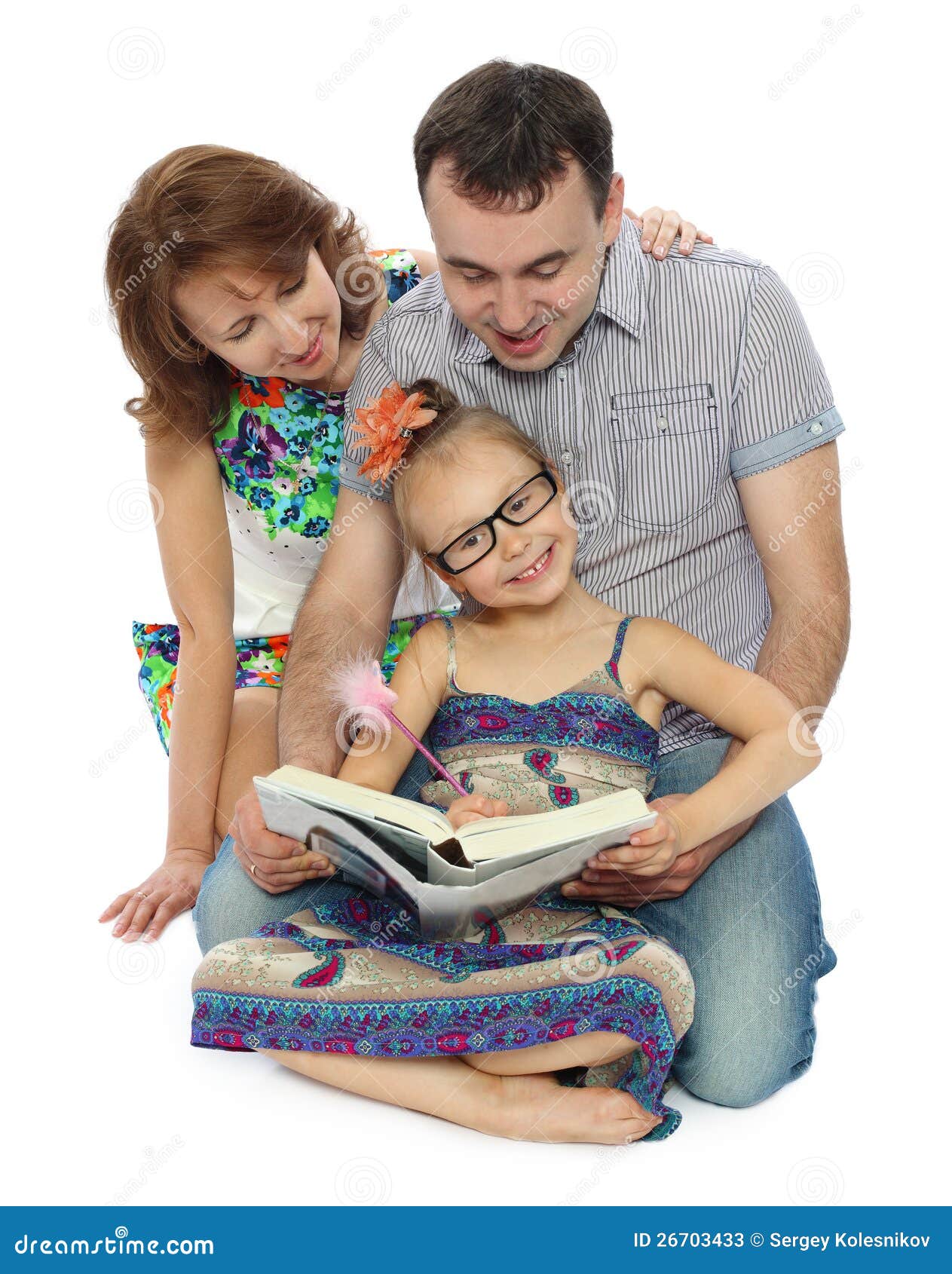 The family reads stock image. Image of little, reading - 26703433