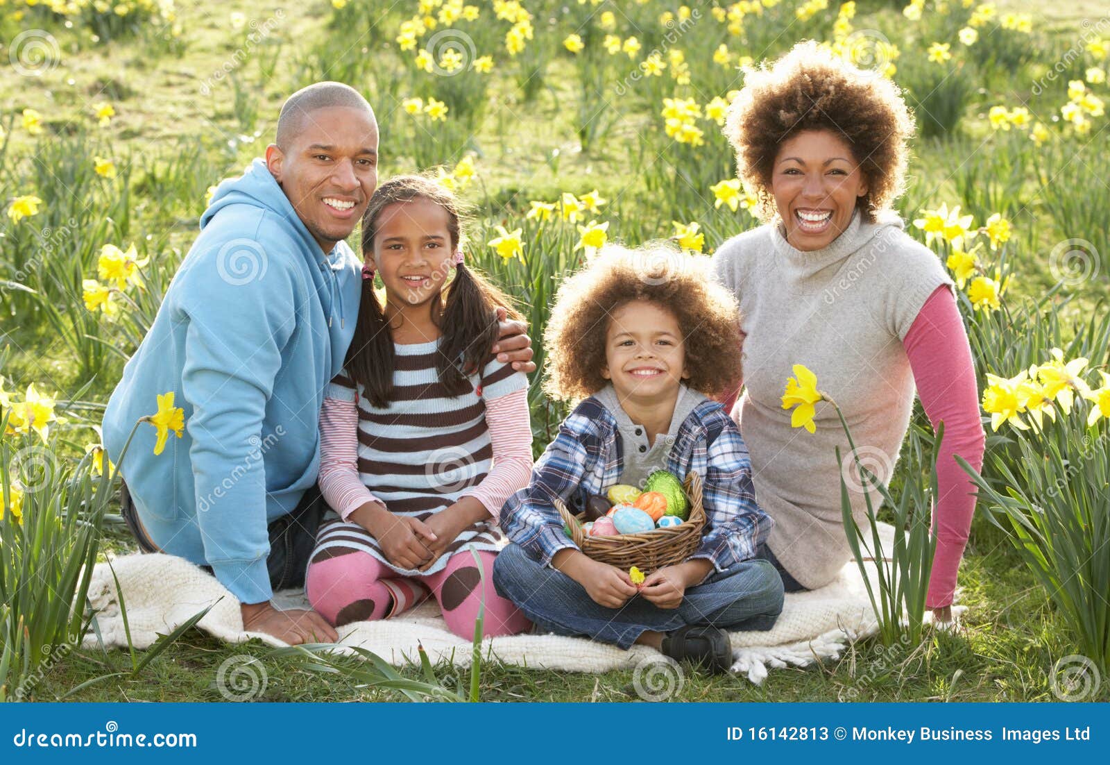 Family Relaxing in Field of Spring Daffodils Stock Image - Image of ...