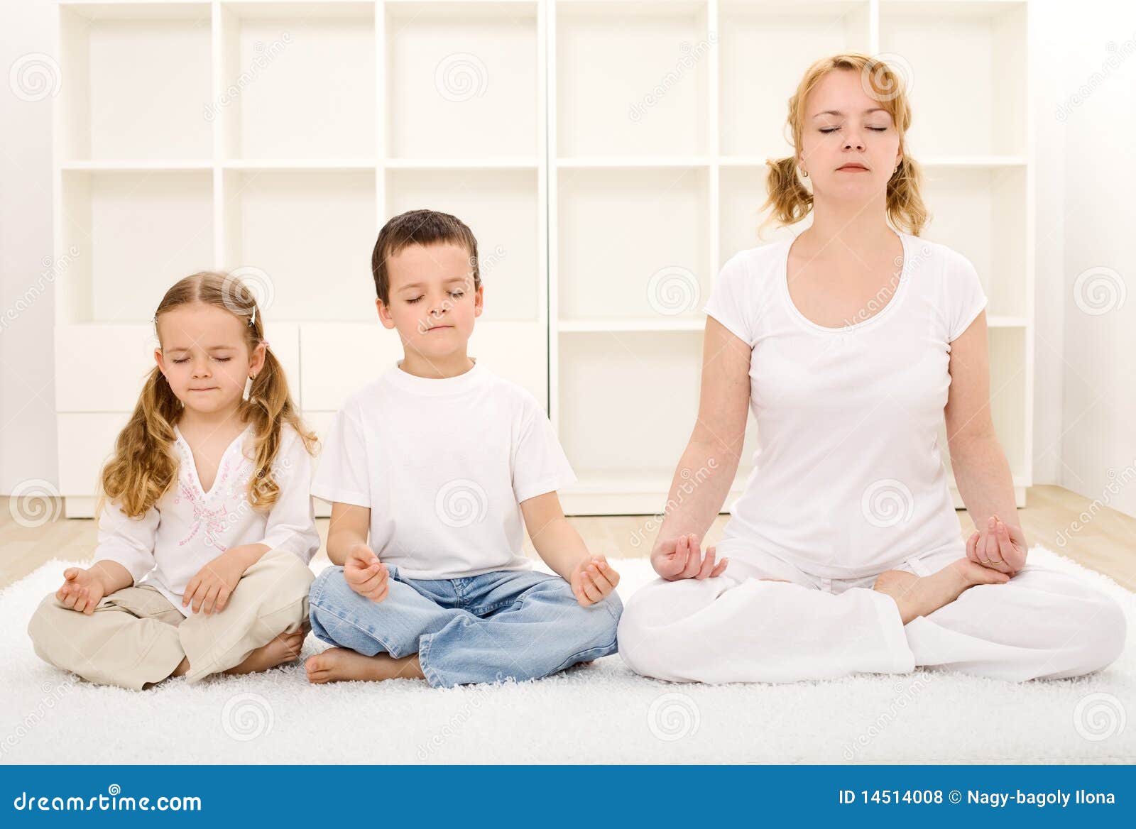 Family relaxing with yoga stock photo. Image of people - 14514008