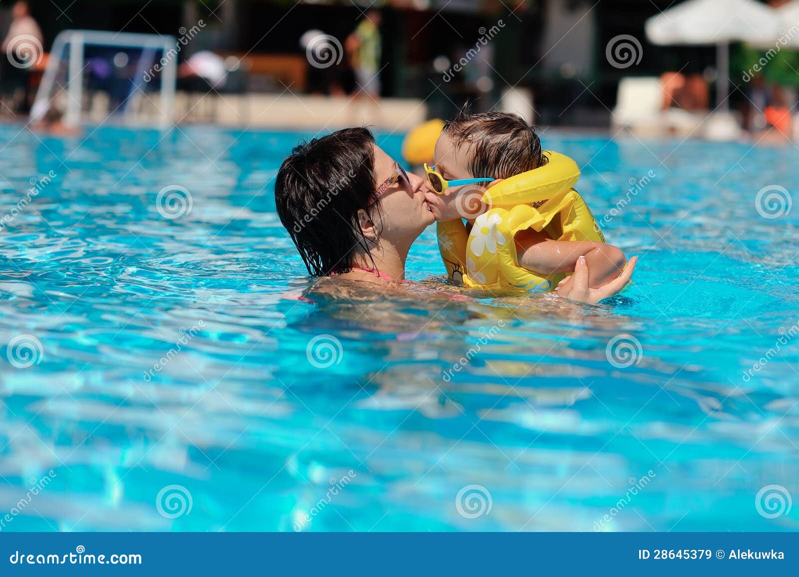 Family rest in pool stock image. Image of recreational - 28645379