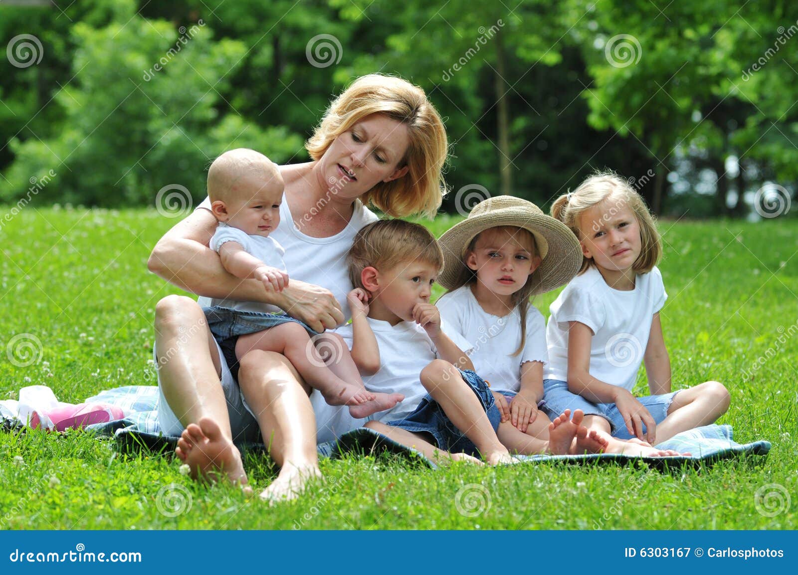 Family resting outdoors stock image. Image of lifestyle - 6303167