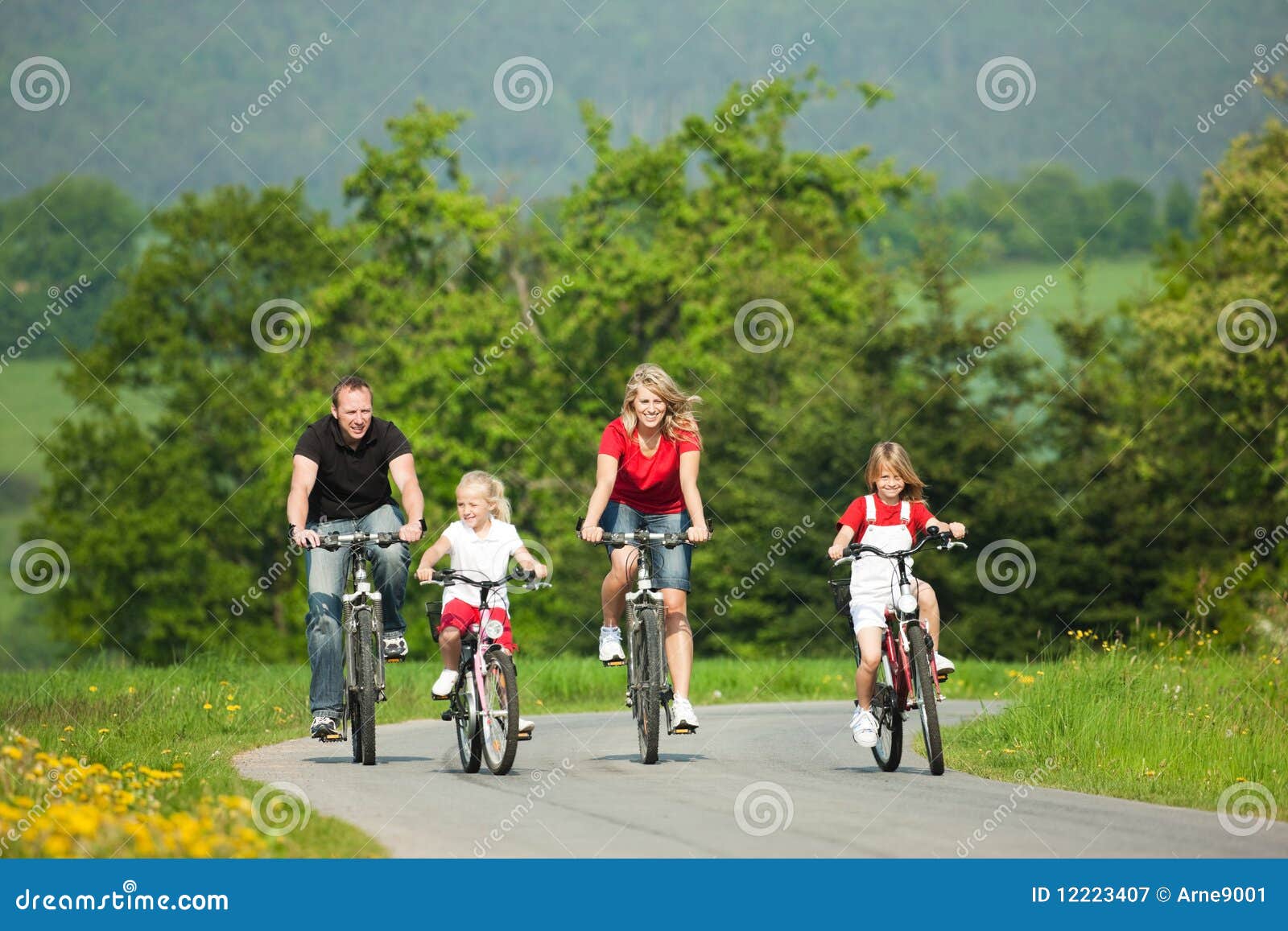 Family riding bicycles stock image. Image of sport, family - 12223407