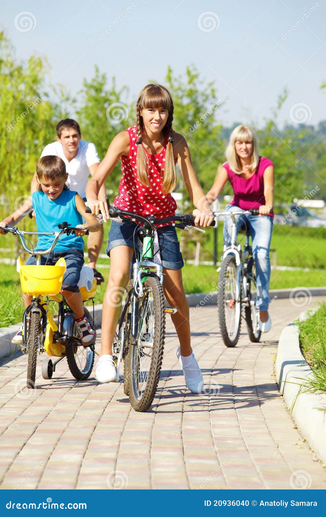 Family riding bicycles stock photo. Image of adult, cheerful - 20936040