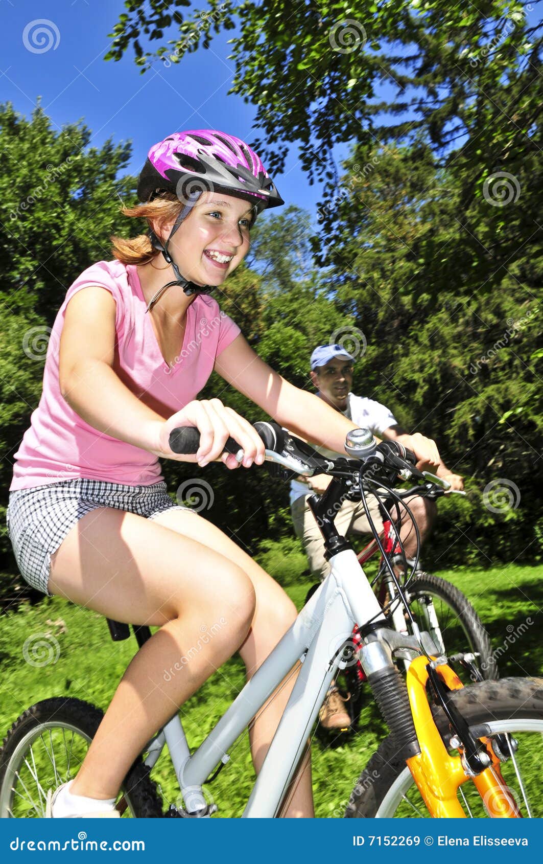 Family riding bicycles stock image. Image of bikes, happy - 7152269