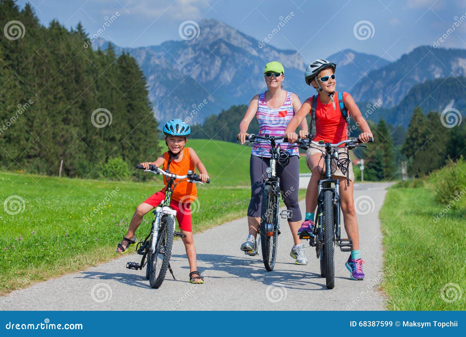 Family riding bikes stock image. Image of adults, austria - 68387599