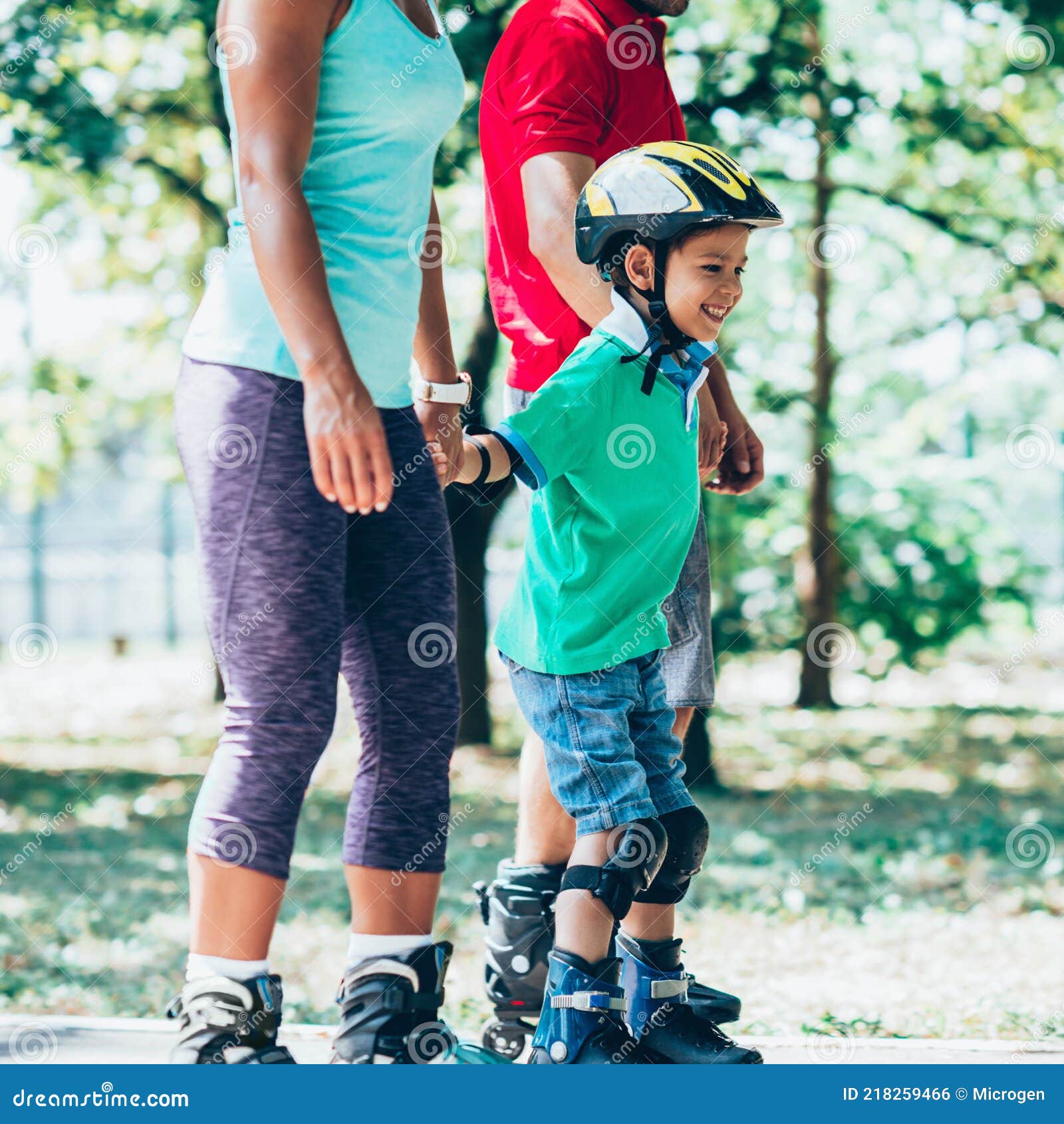 Family Roller Skating in Park Stock Photo - Image of concepts, clothing ...