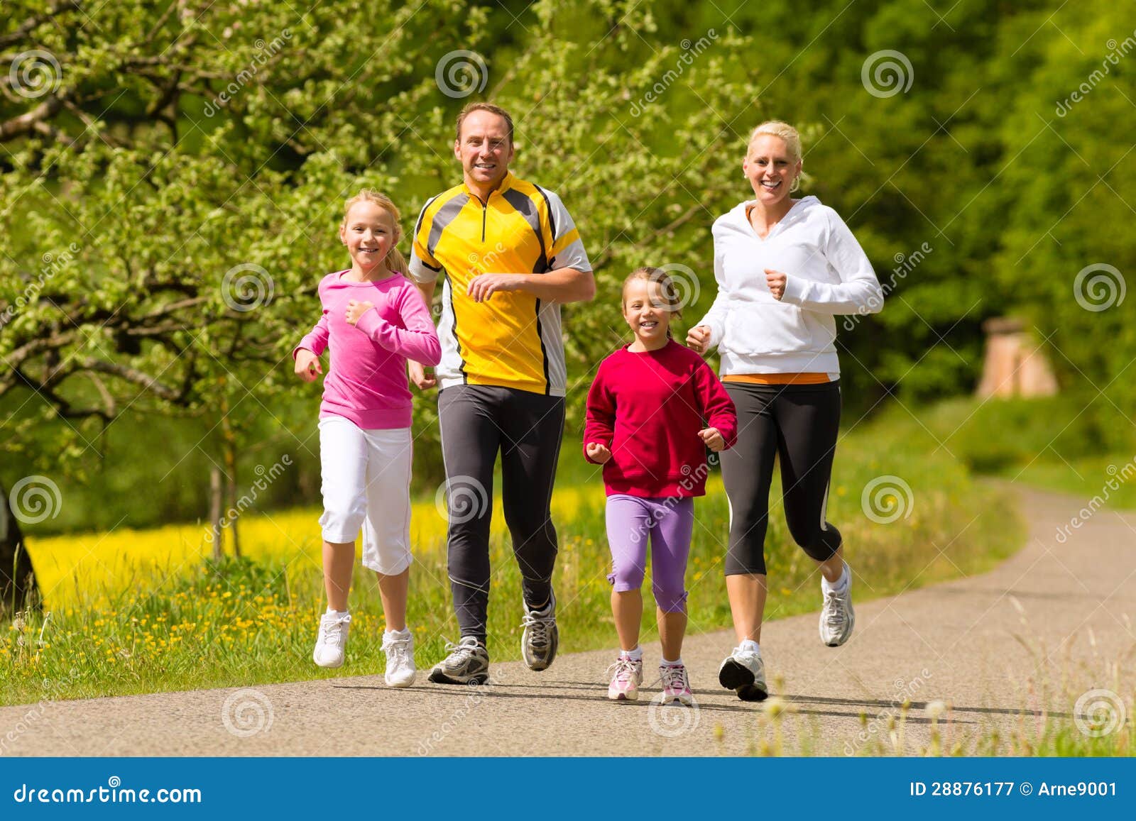 Family Running in the Meadow for Sport Stock Image - Image of sunlight ...