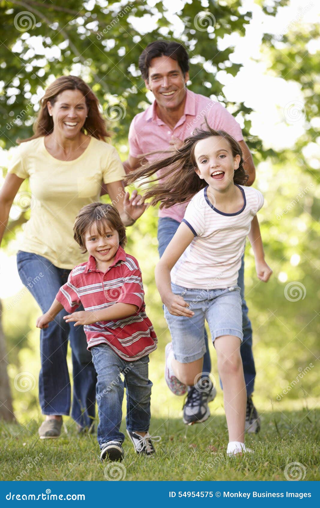 Family running in park stock image. Image of chasing - 54954575