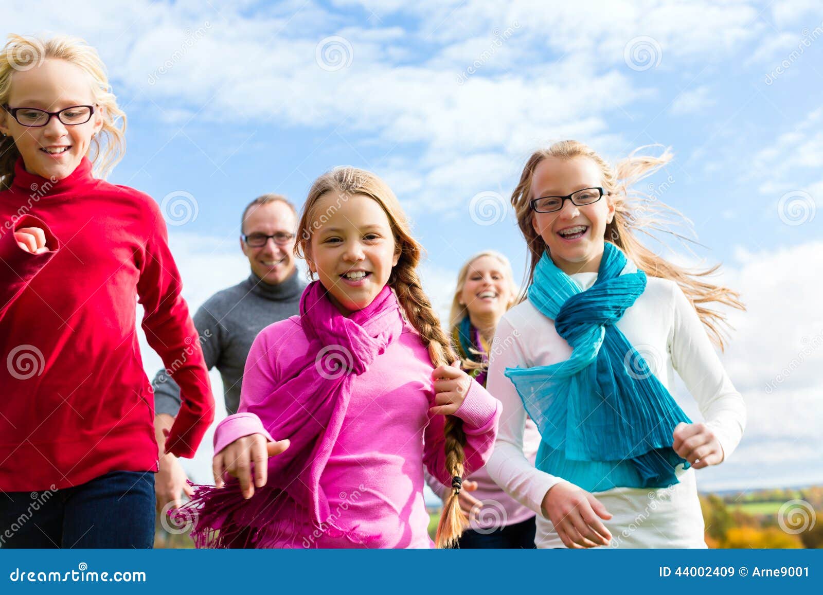 Family Running through Park Stock Image - Image of family, park: 44002409