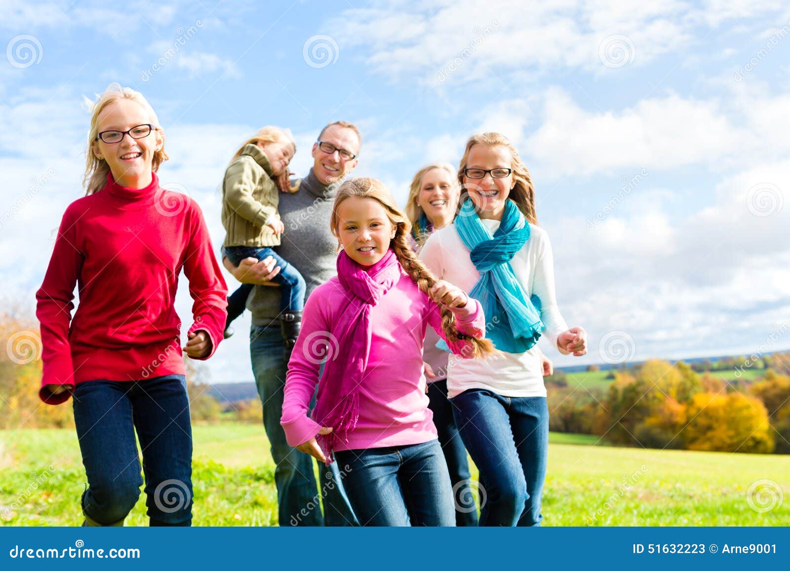 Family Running through Park in Fall Stock Image - Image of running ...