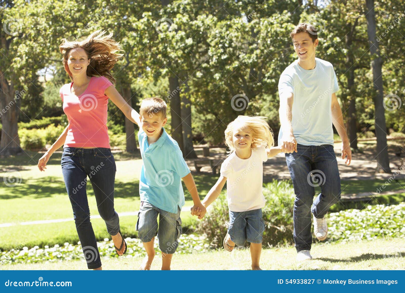 Family Running Towards Camera in Summer Park Stock Image - Image of ...